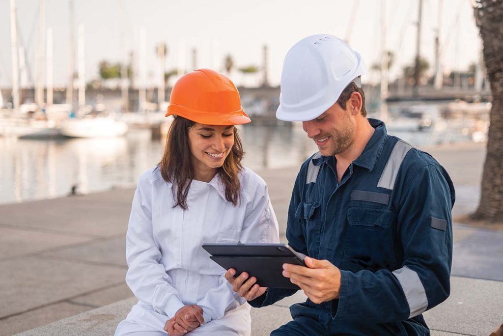Marine staff with tablet in port | Marina Dock Age